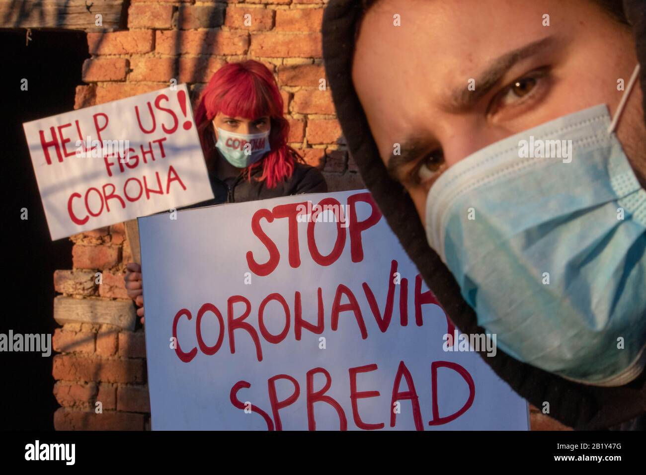 STOP CORONA SPRED Banner. Young people protest for Corona virus ...