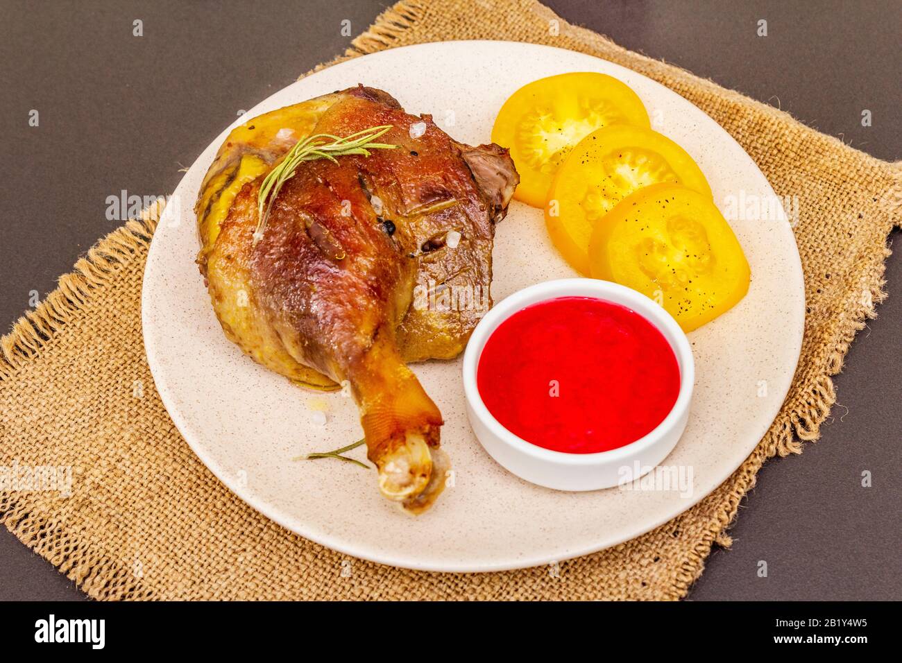 Crusty roasted duck leg. Traditional French food confit preparation ...