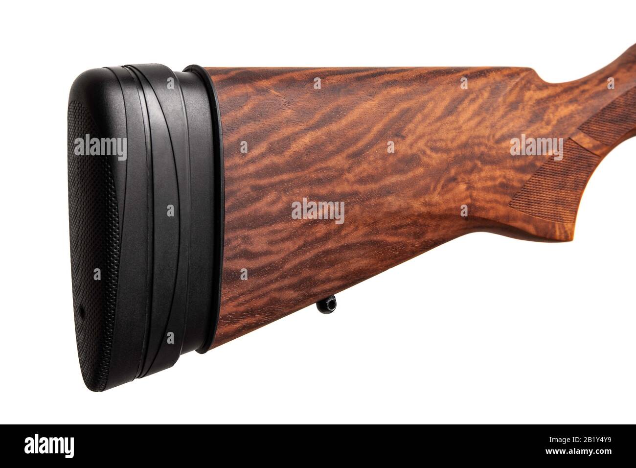 Closeup of a wooden shotgun butt. Hunting semi-automatic shotgun with a ...