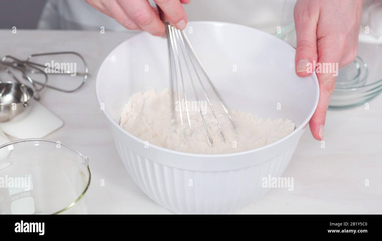 Step by step. Mixing batter to bake vanilla cupcakes with buttercream ...