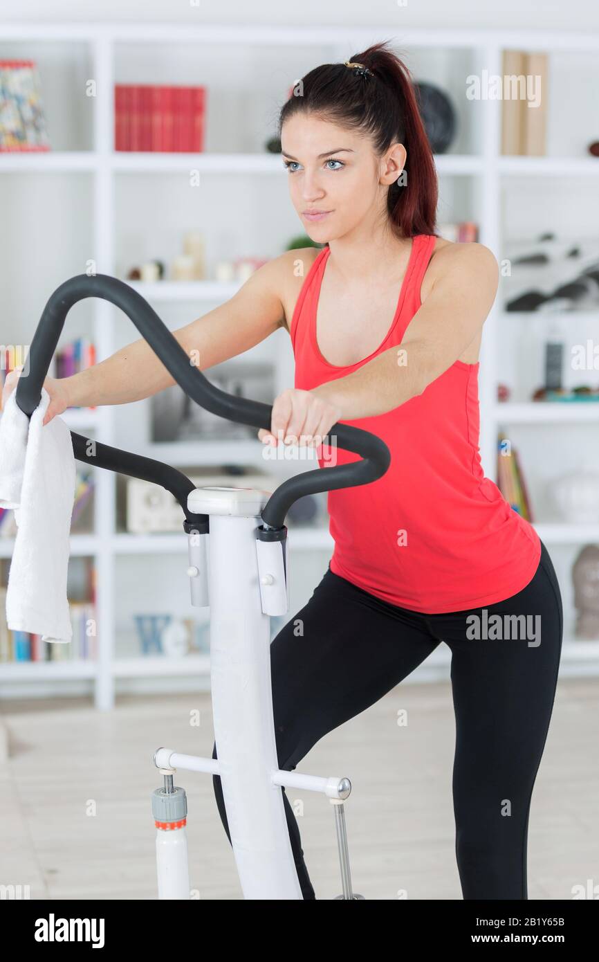 young woman at home on stepper machine Stock Photo - Alamy