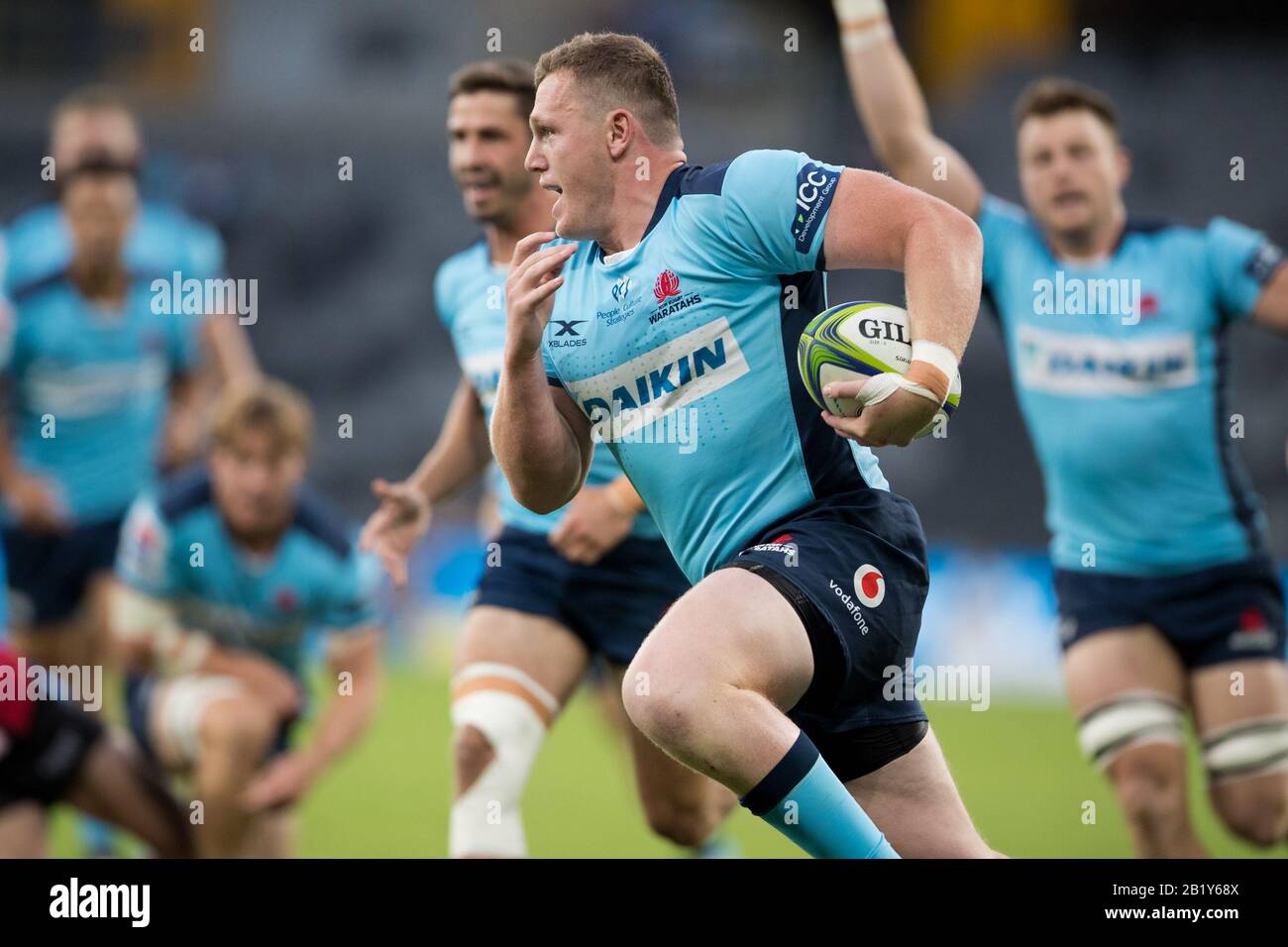 Angus Bell of Waratahs breaks the defence to score first try during the ...