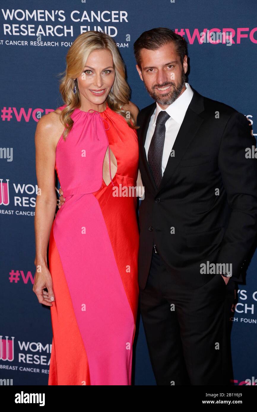 Beverly Hills, USA. 27th Feb, 2020. Jamie Tisch and guest walking the ...