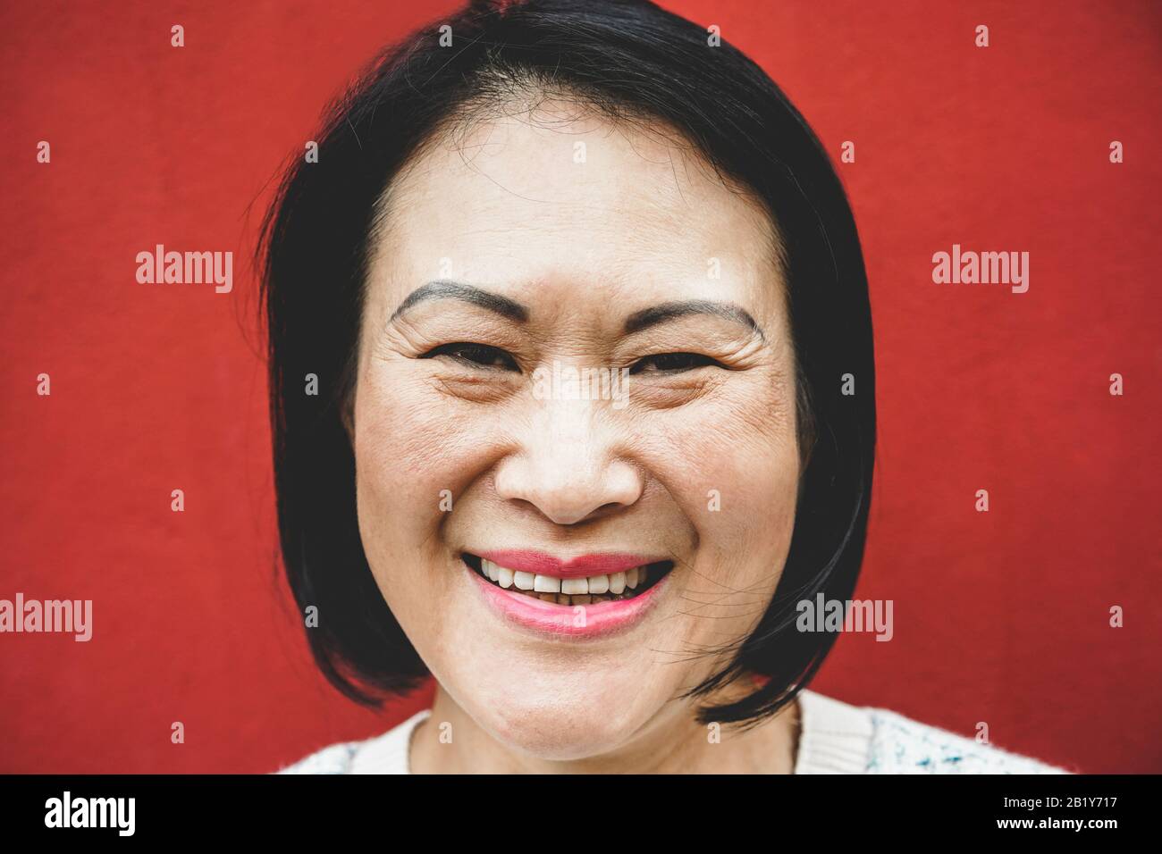 Joyful elderly woman in 50s hi-res stock photography and images - Alamy