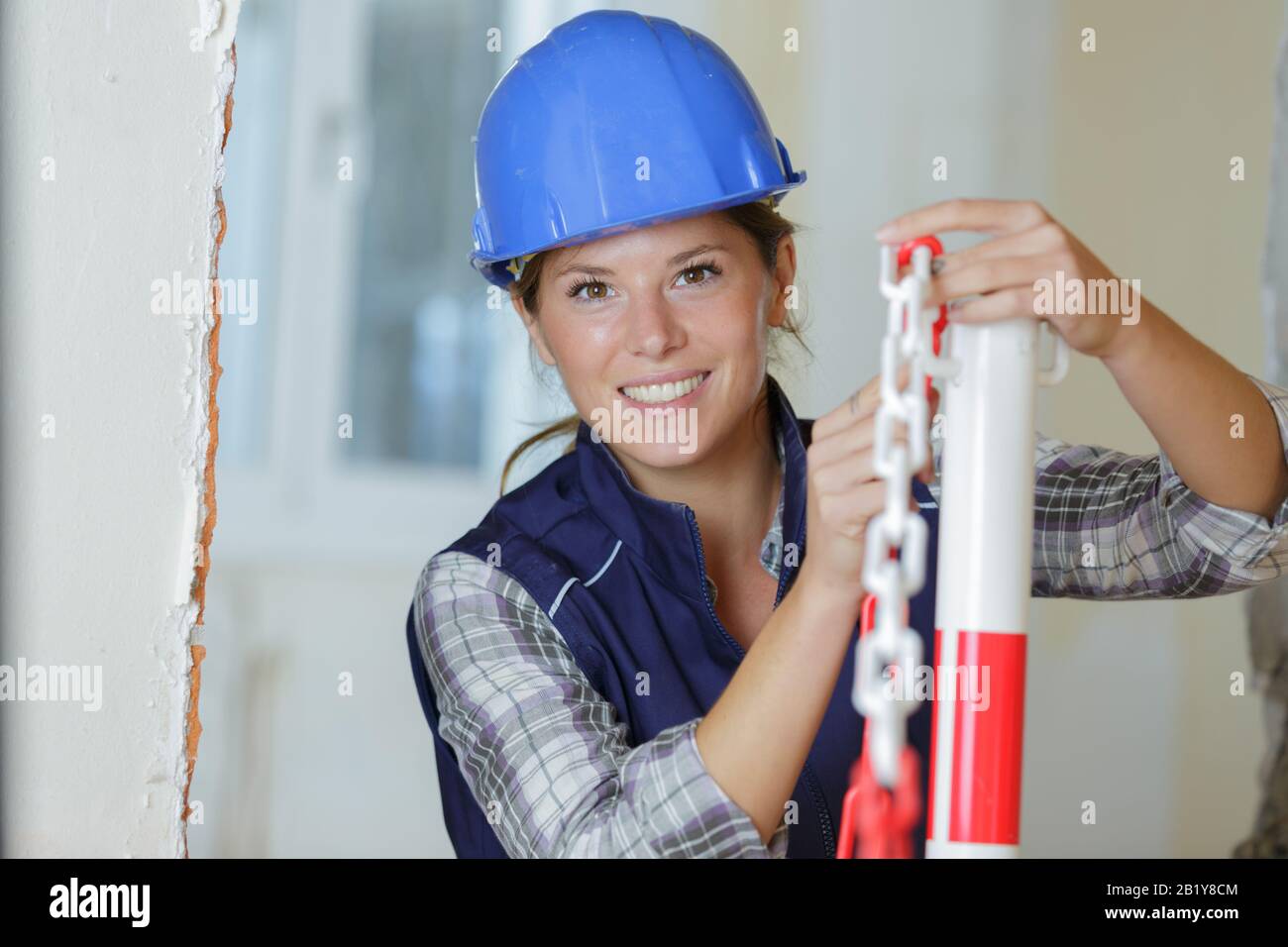 happy female builder at work Stock Photo - Alamy