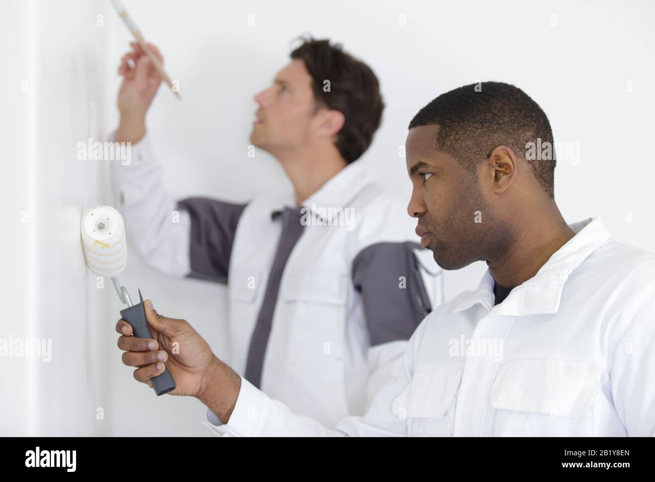 two painters are at work Stock Photo - Alamy