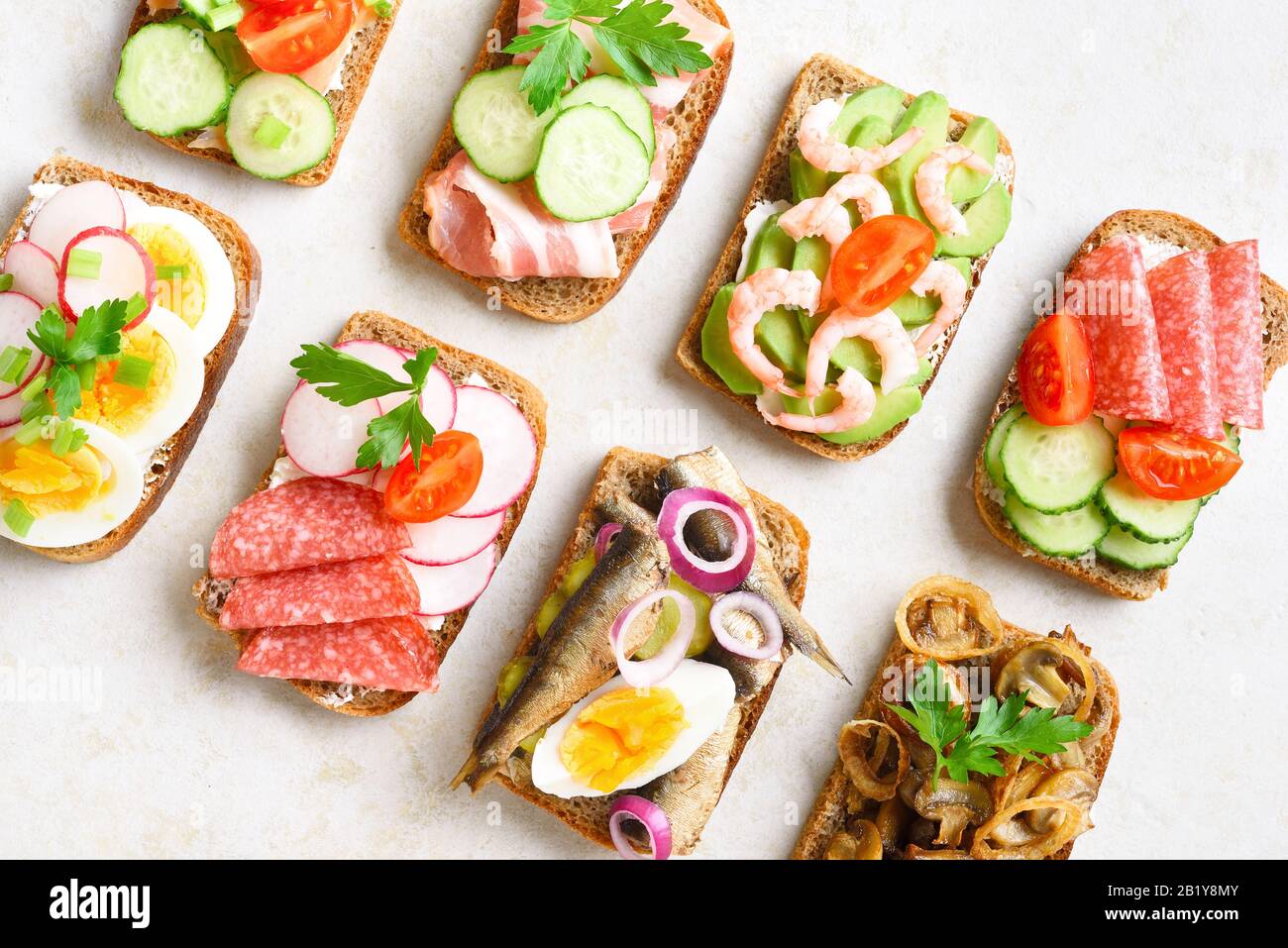 Set of different sandwiches with meat, vegetables, seafood. Assortment ...