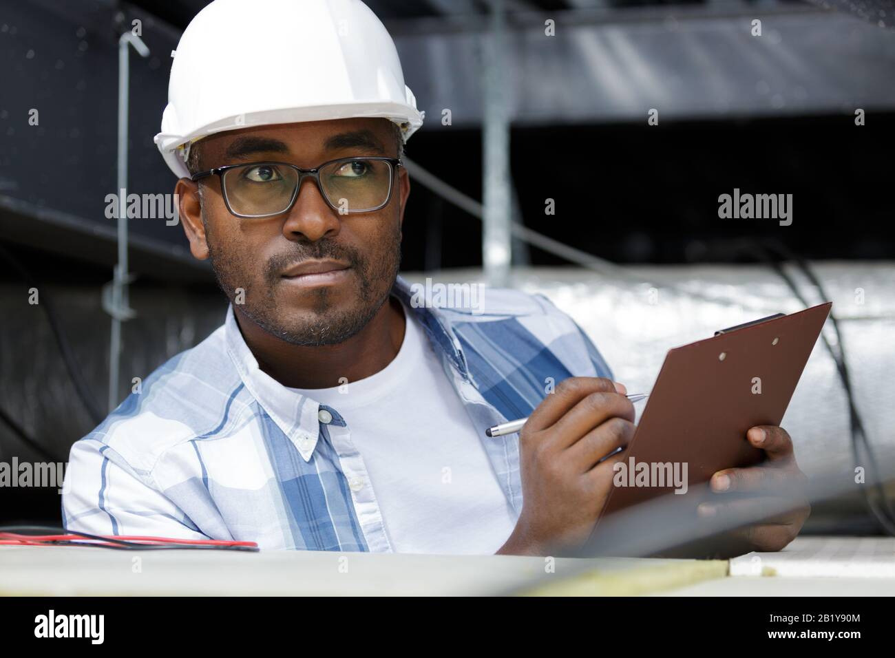 Roof inspection ladder hi-res stock photography and images - Alamy