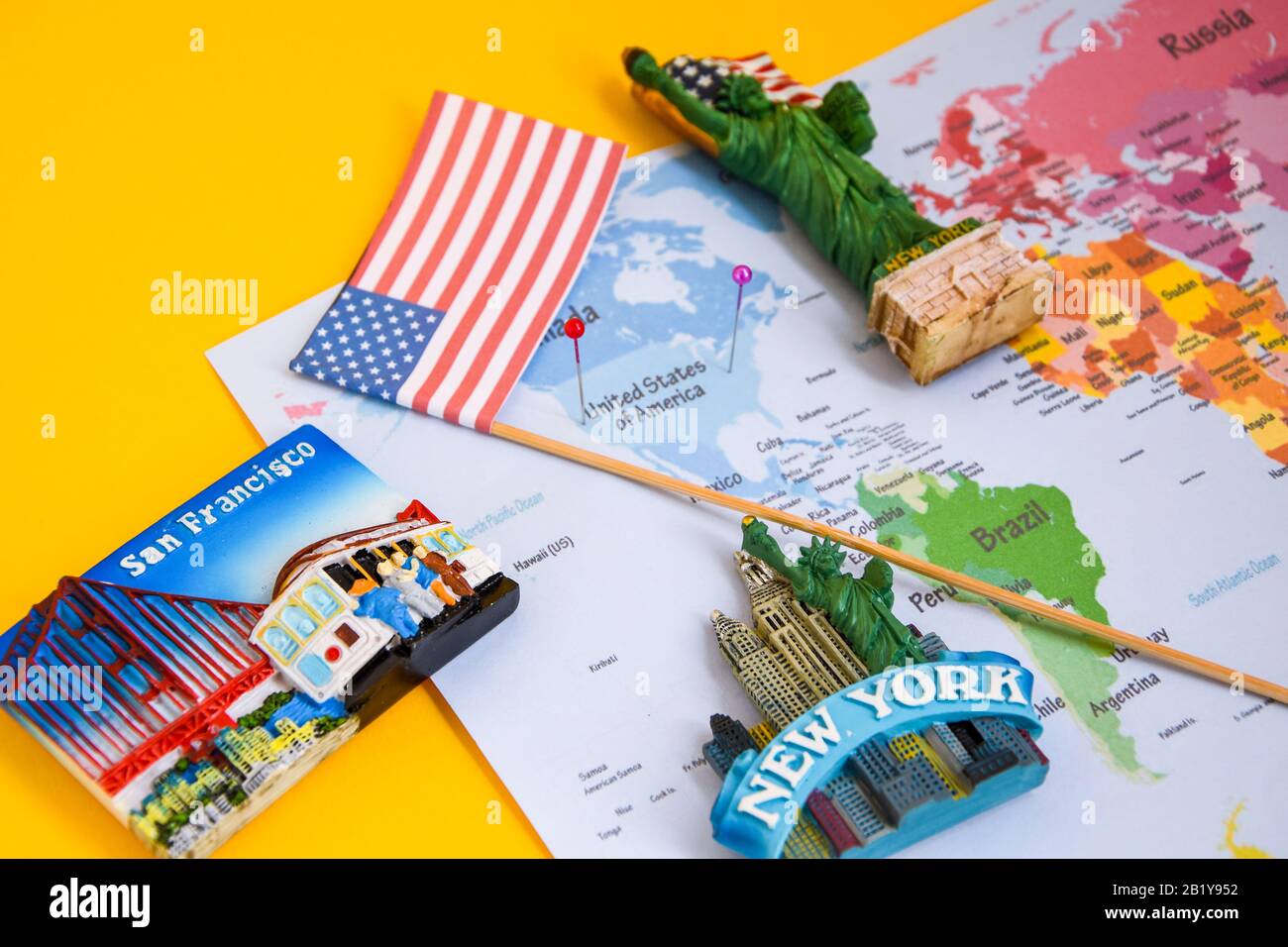 Usa flag and magnets from new york and san francisco over world map ...