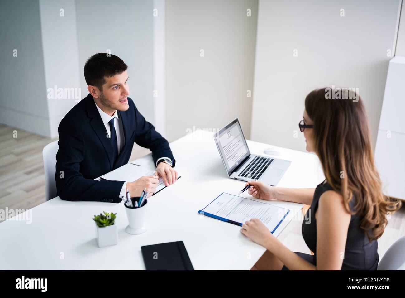 Man Sitting At Job Interview In Office Stock Photo - Alamy