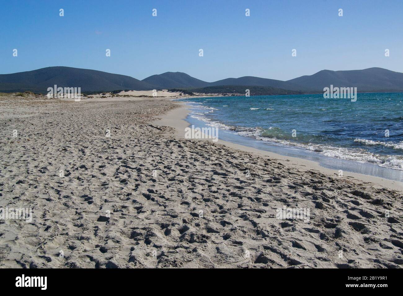 View of Porto Pino beach Stock Photo - Alamy