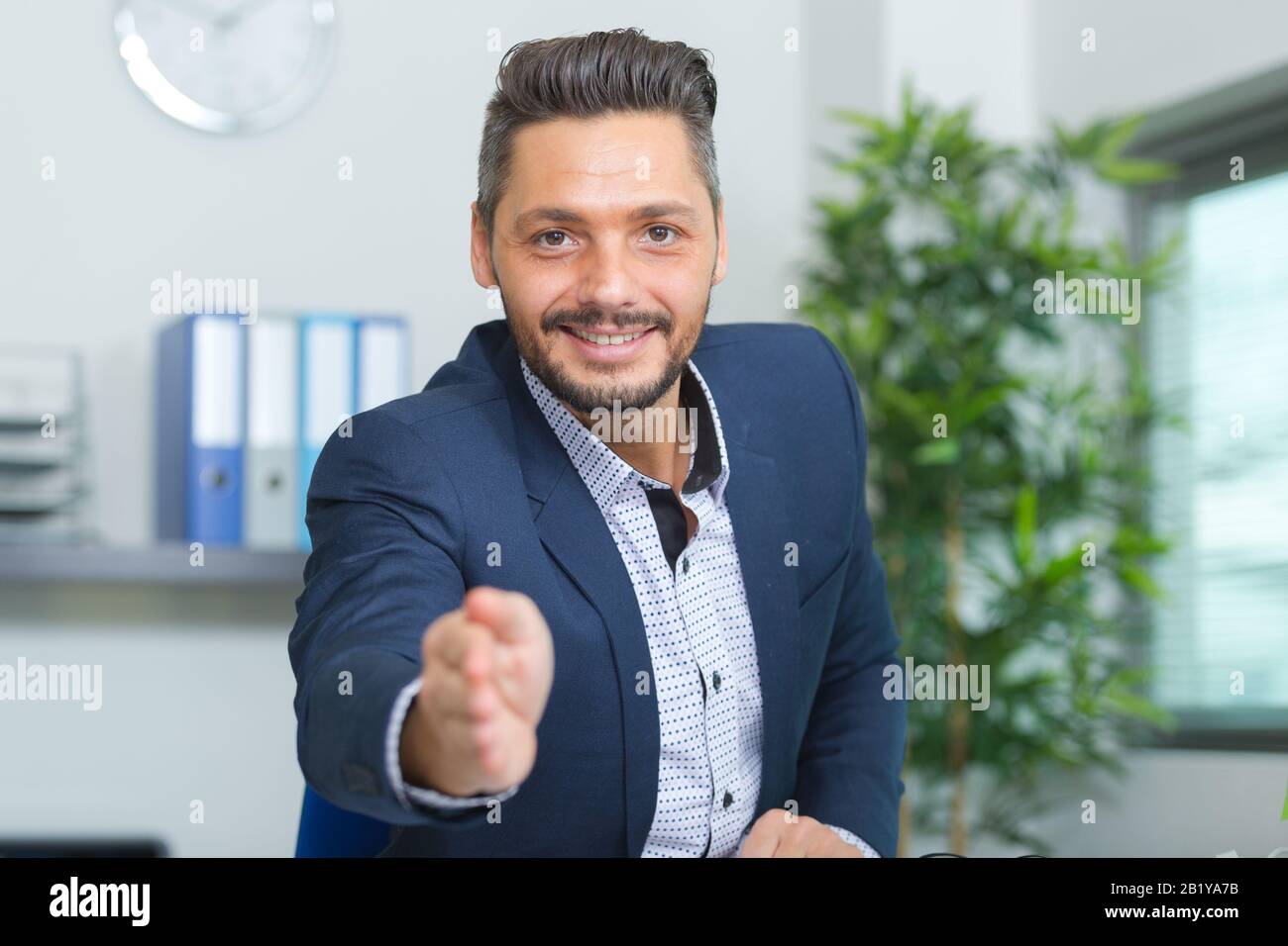 portrait of a business handshake Stock Photo - Alamy