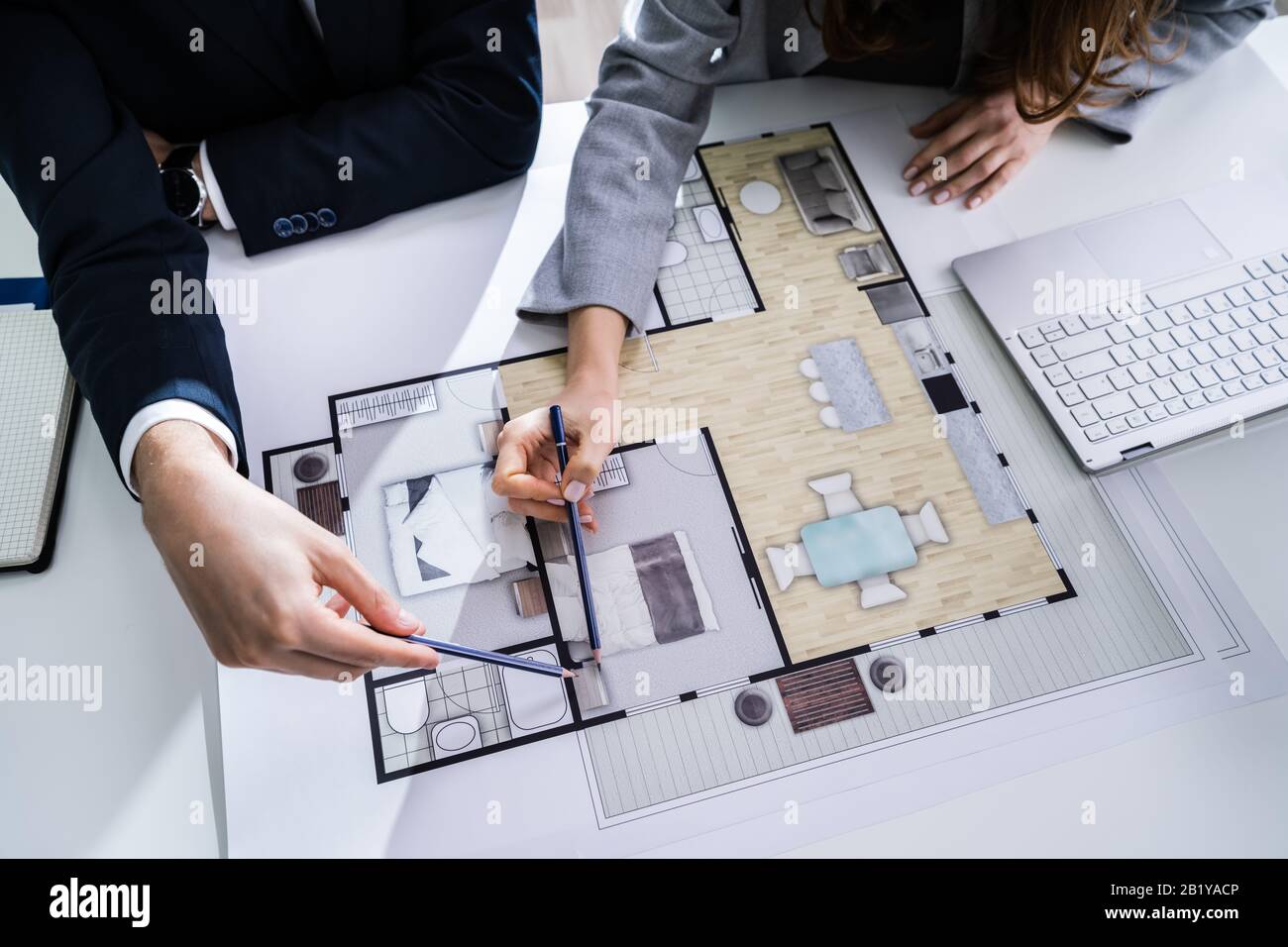 Close-up Of Two Architects Hands Working On Blueprint Stock Photo - Alamy