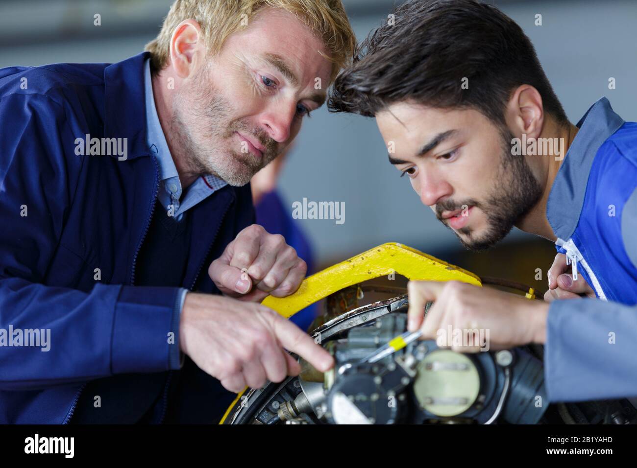 portrait of male car mechanics at work Stock Photo - Alamy