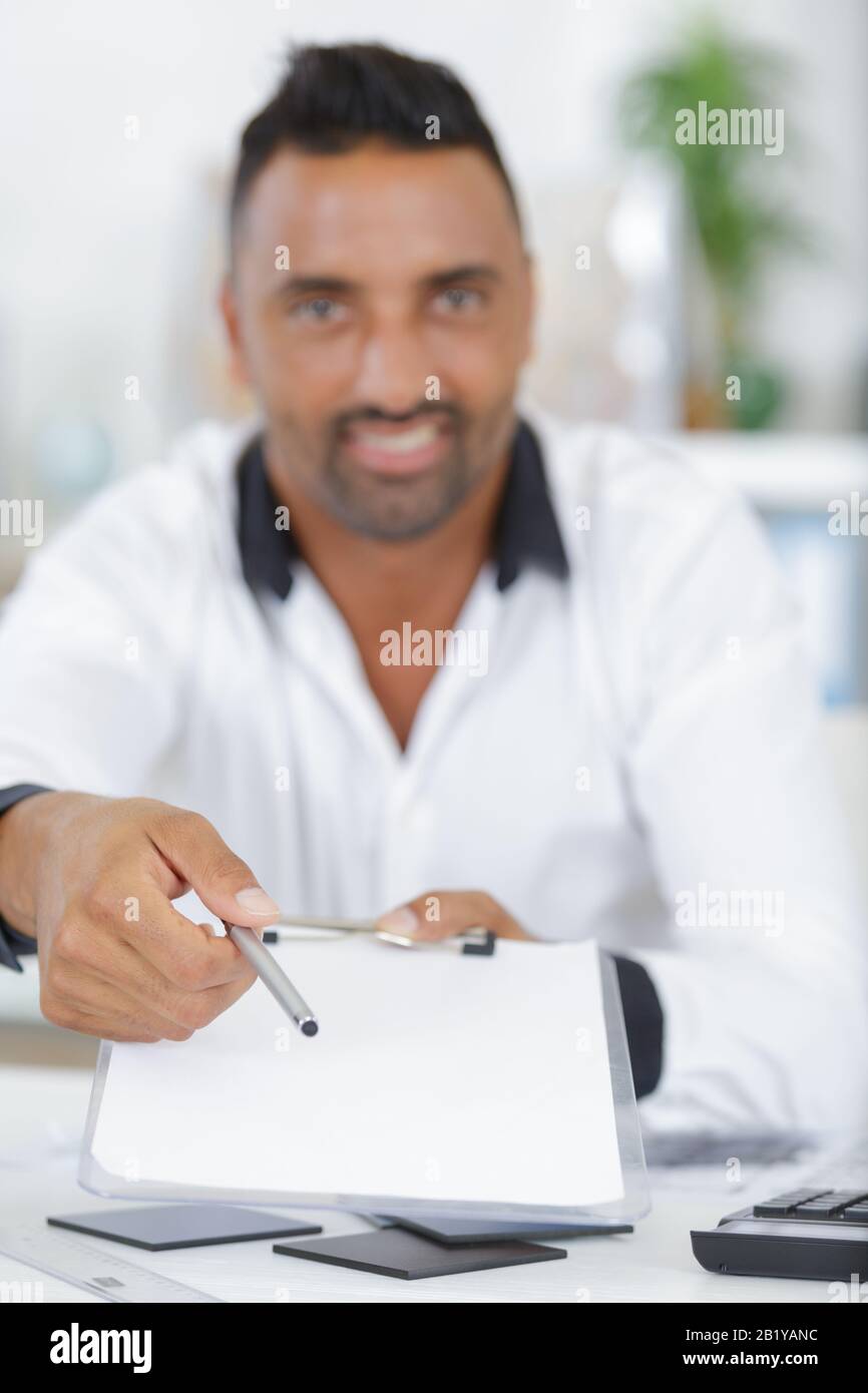 Successful signature sitting hi-res stock photography and images - Alamy