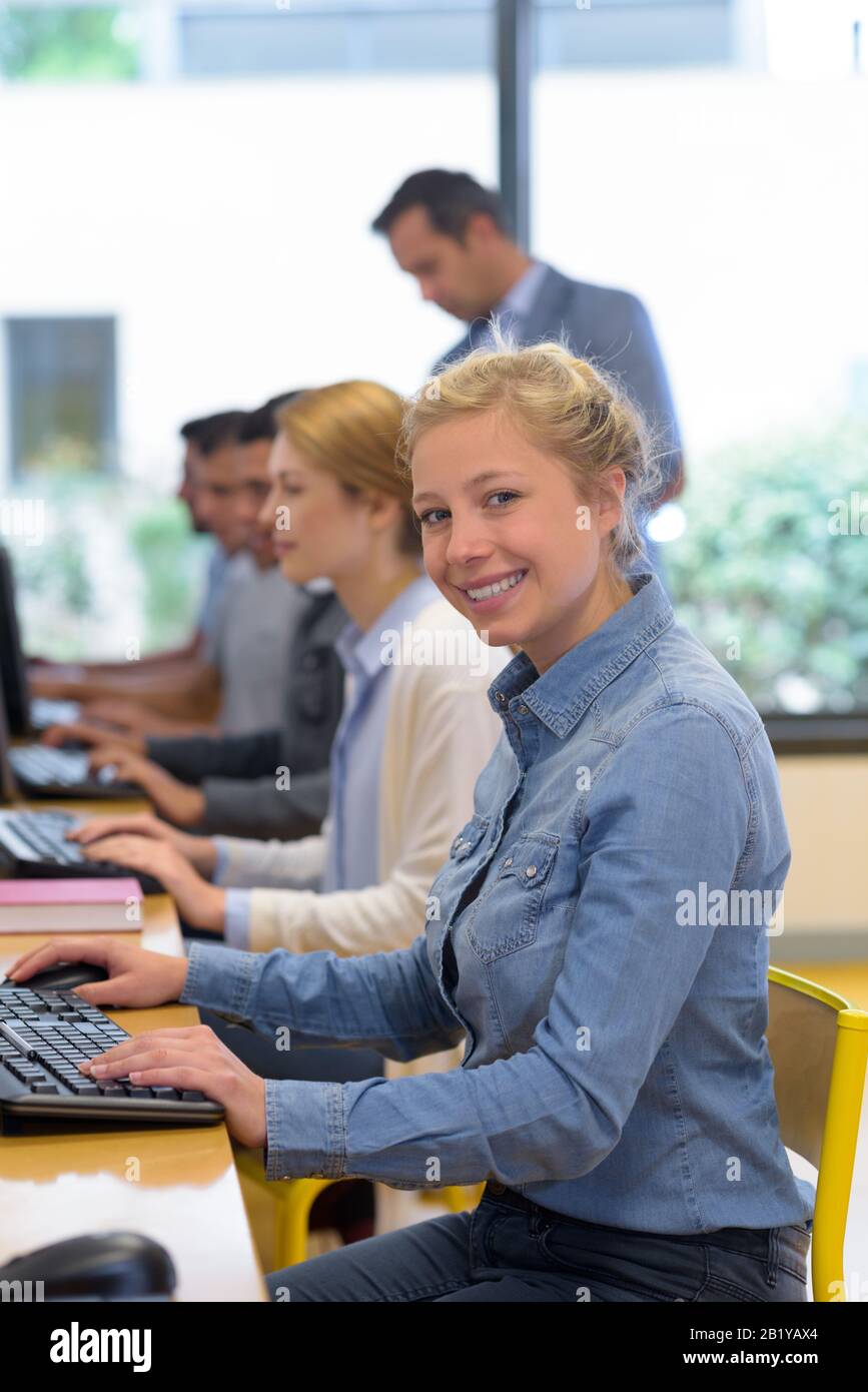 happy female student in the classroom Stock Photo - Alamy