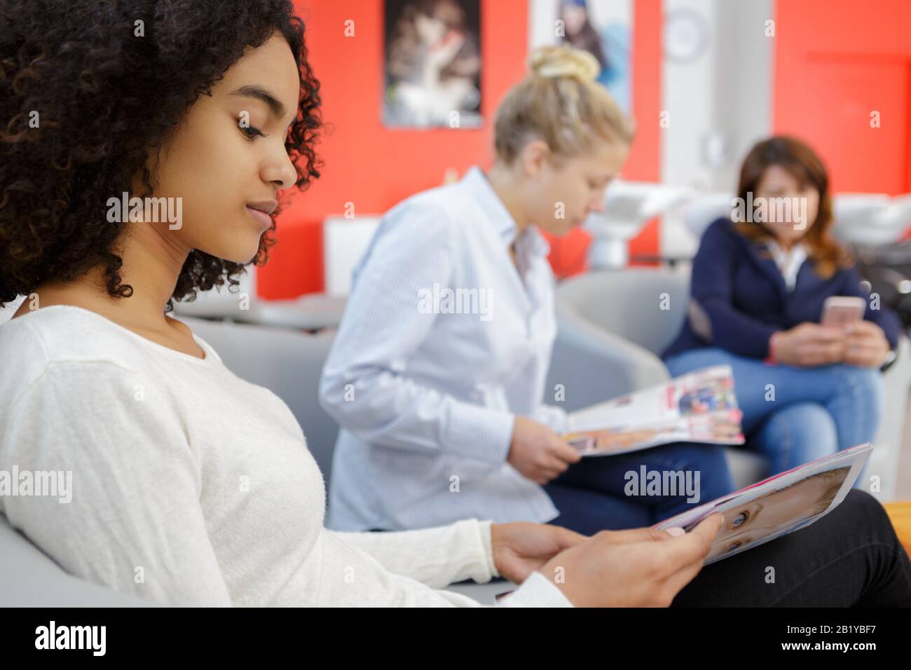 Salon chair reading hi-res stock photography and images - Alamy