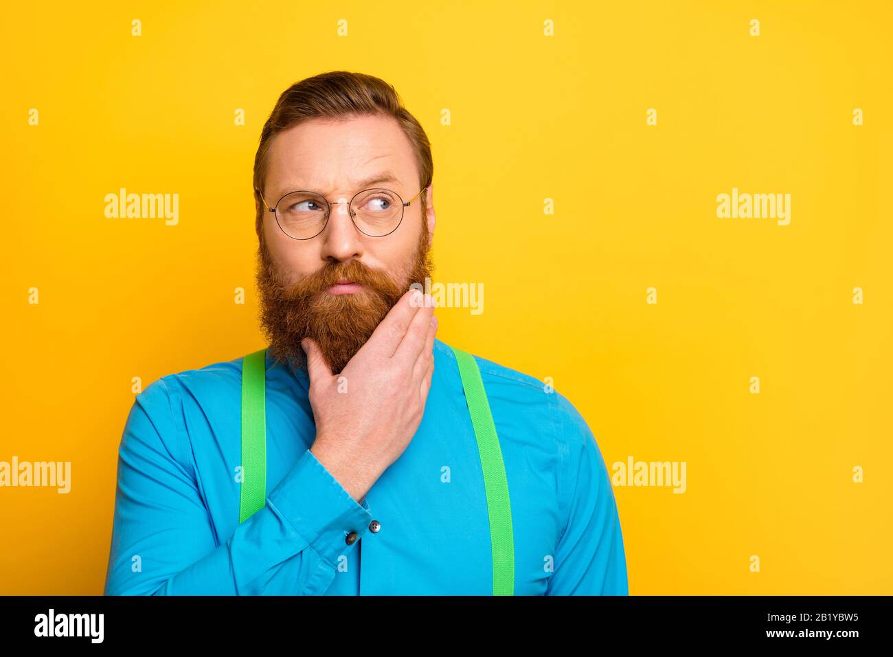 Closeup photo of attractive strict red head boss guy arm on chin neat ...