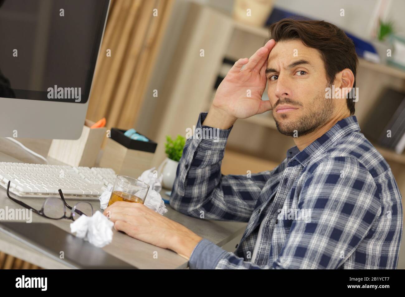picture of overworked man in the office Stock Photo - Alamy