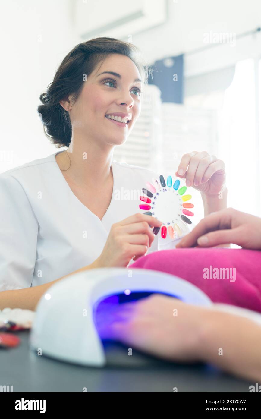 Multiple nail colors hi-res stock photography and images - Alamy