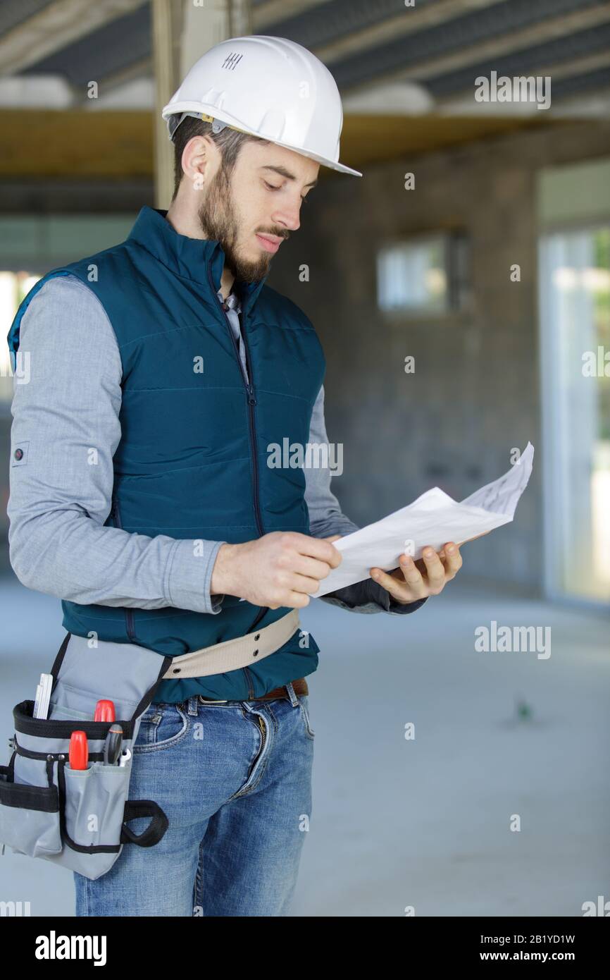 construction worker on building site Stock Photo - Alamy