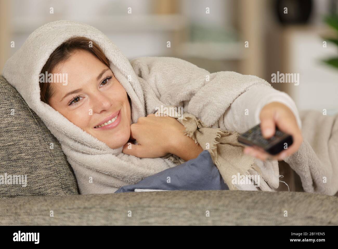 Woman television remote control hi-res stock photography and images - Alamy