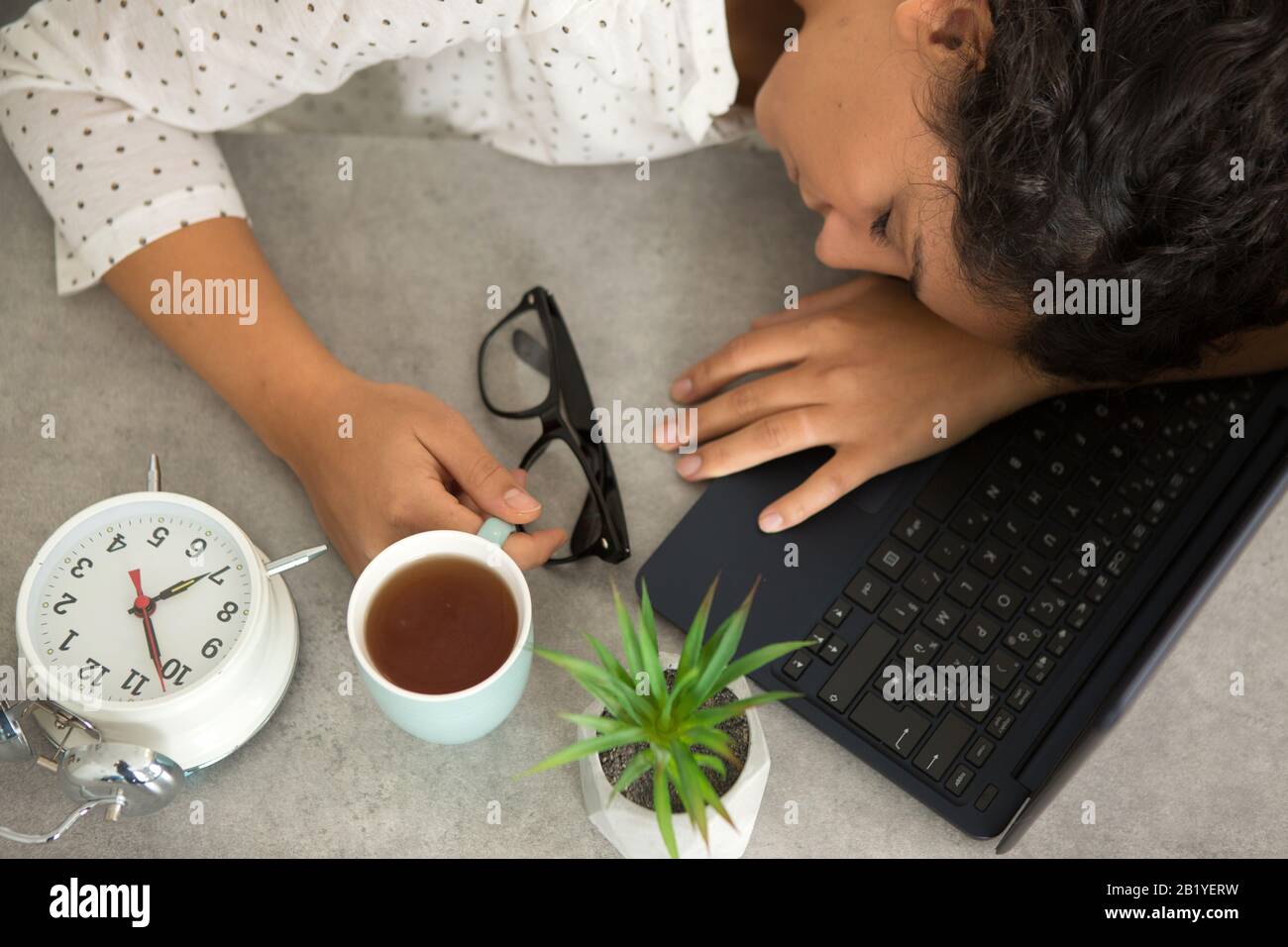 she is sleepy at work Stock Photo - Alamy