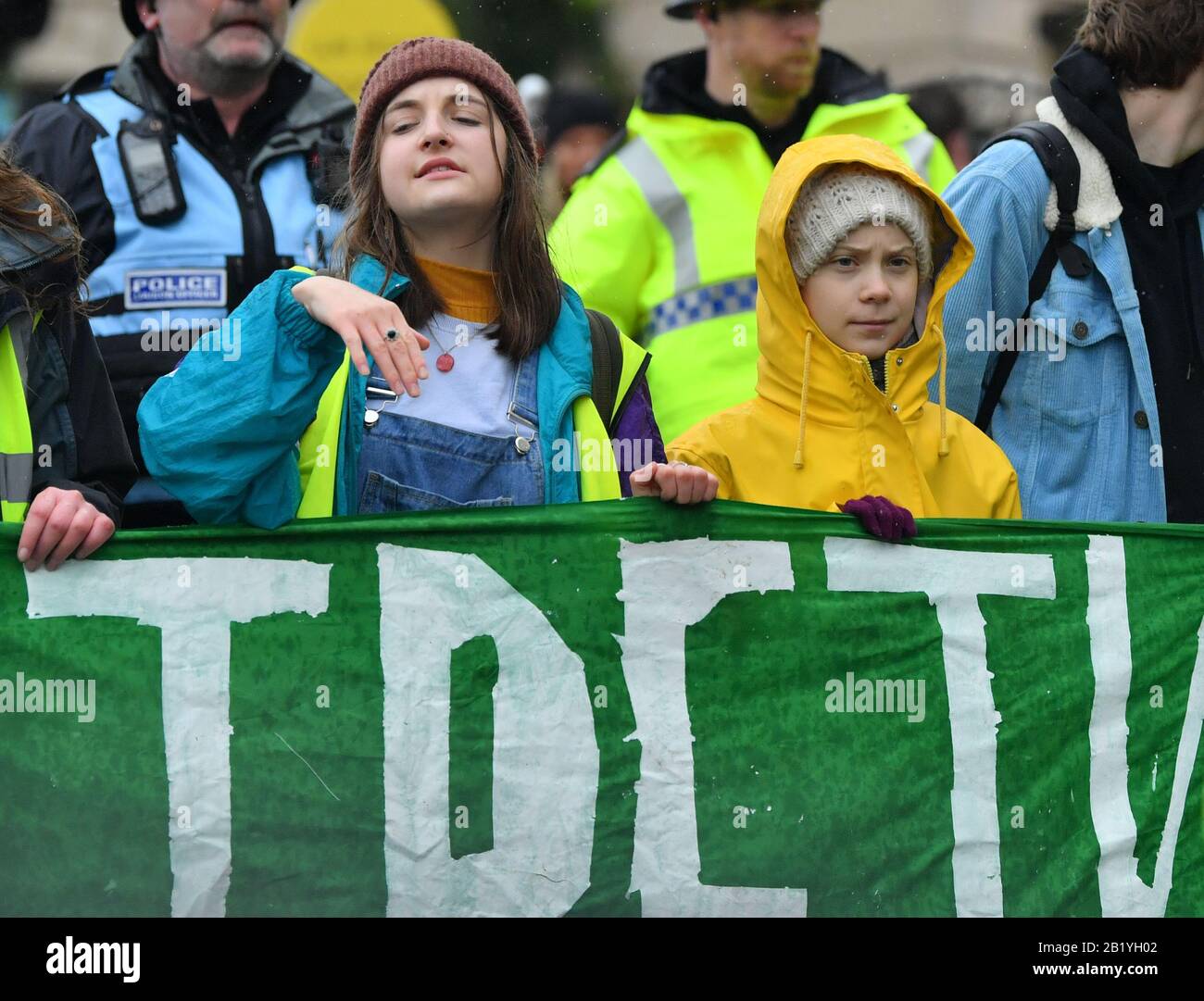 Environmental activist Greta Thunberg (right) marches during a Youth ...