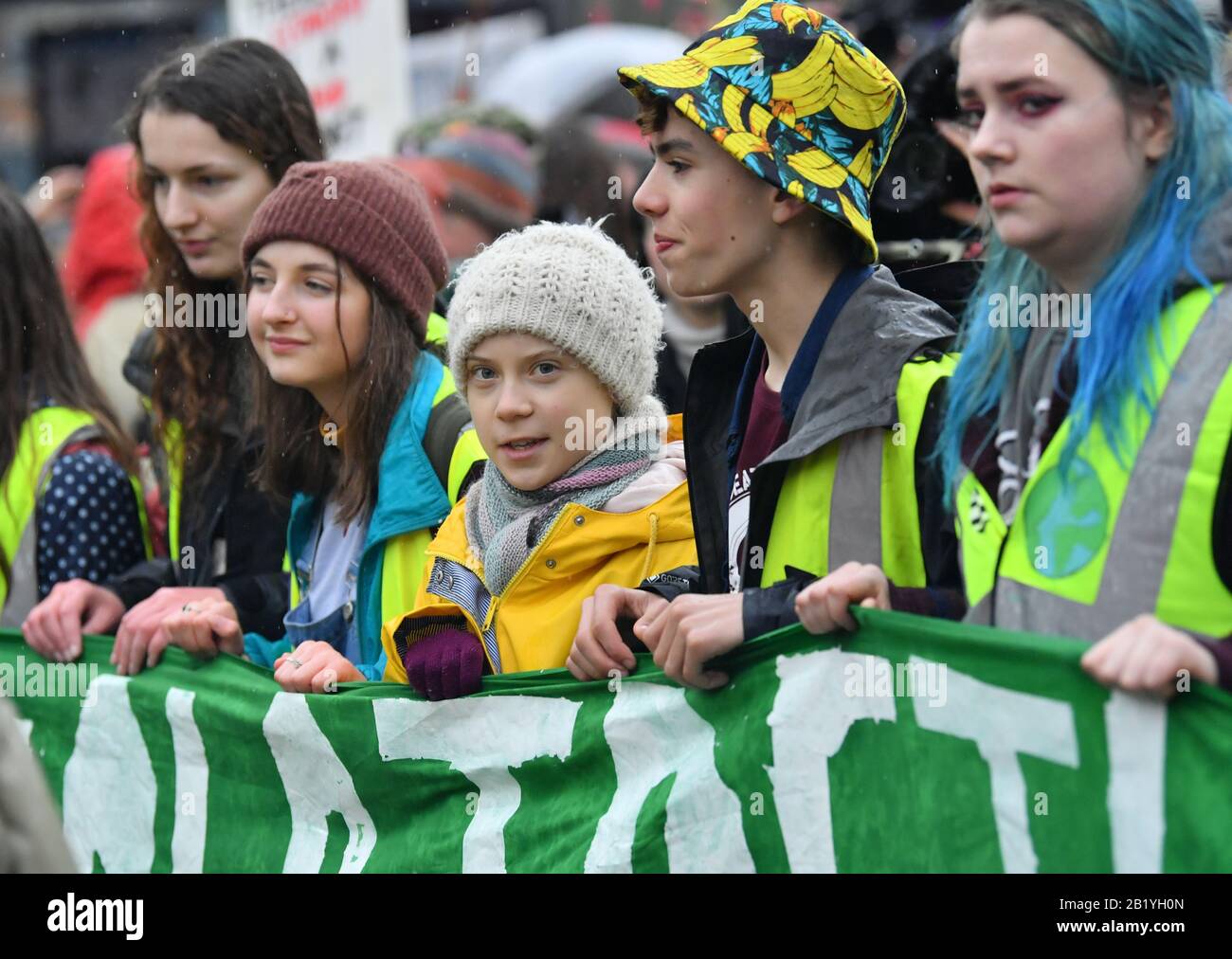 Environmental activist Greta Thunberg (centre) marches during a Youth ...
