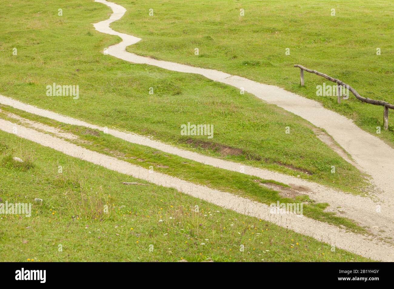 A single mountain path splits in two different directions Stock Photo ...