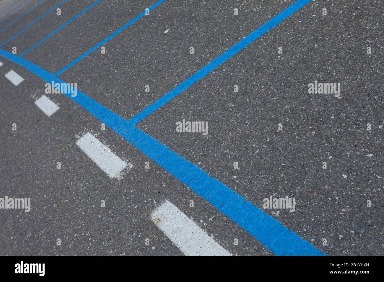 car park area with blue line for ticketing Stock Photo - Alamy