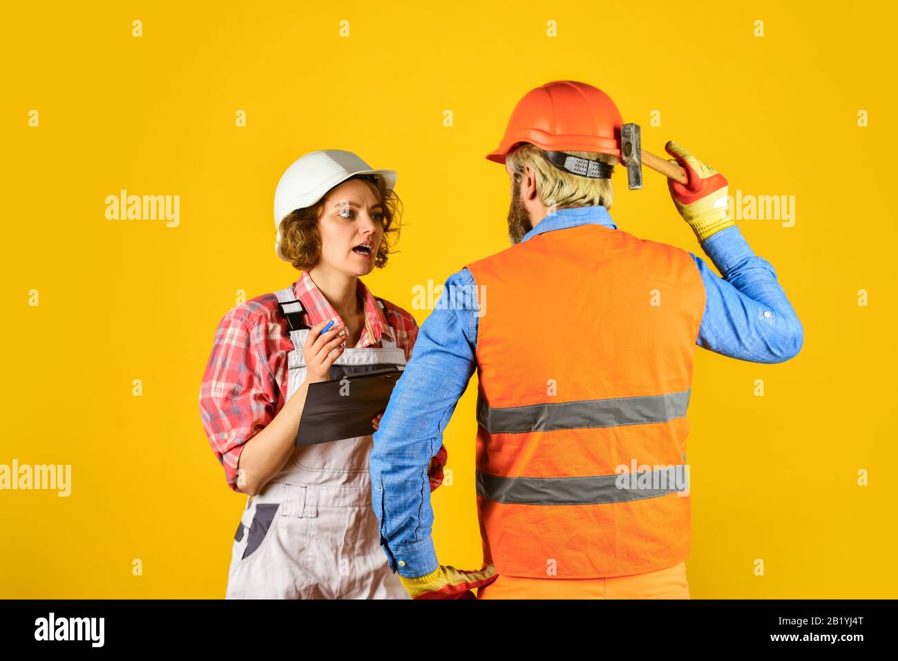 teamwork. family standing inside house under construction. renovation ...