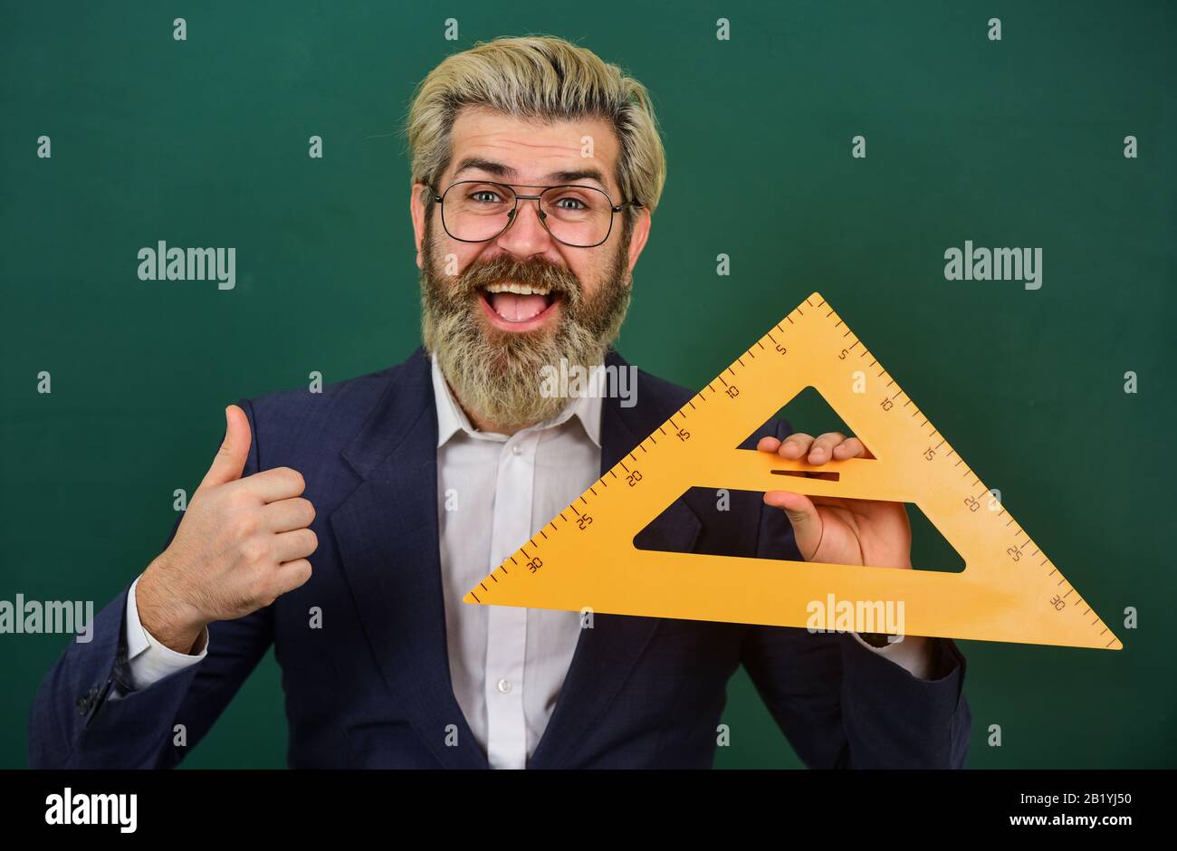 Mathematics favorite subject. Man teacher use math rule tool. Bearded ...