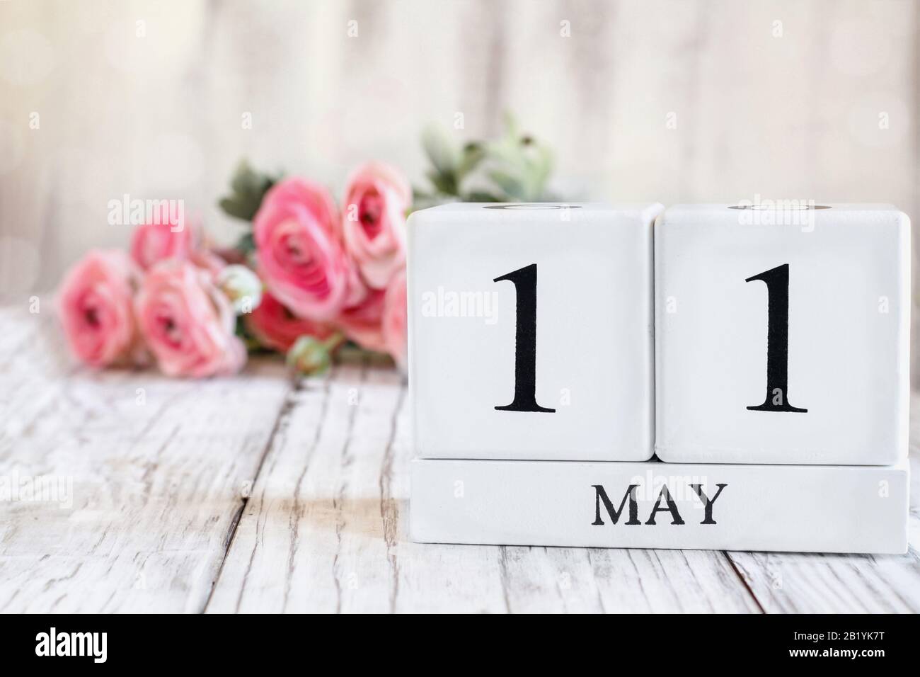 White wood calendar blocks with the date May 11 th for National Women's ...