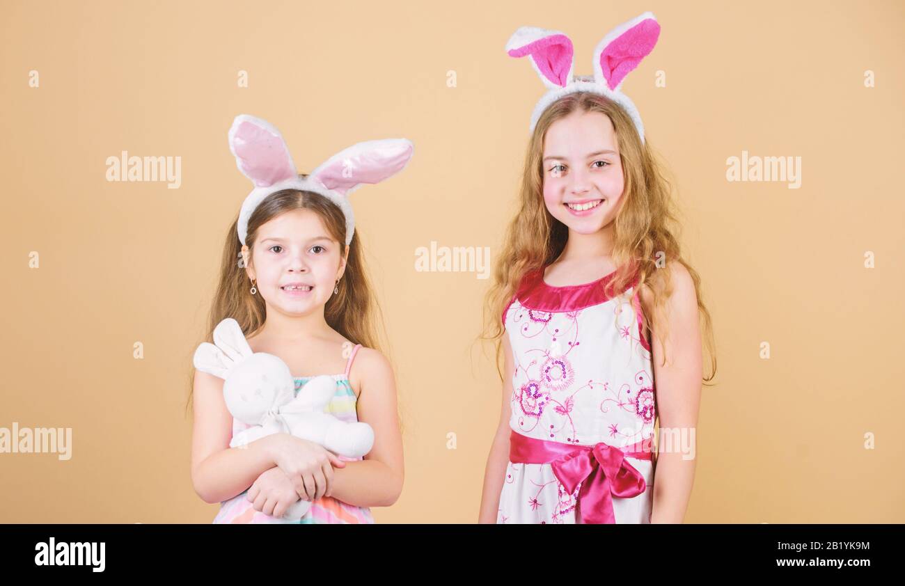 The bunny rabbits are so cute. Happy children celebrating Easter ...