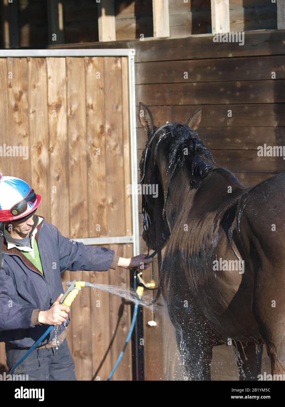 Being hosed down hi-res stock photography and images - Alamy