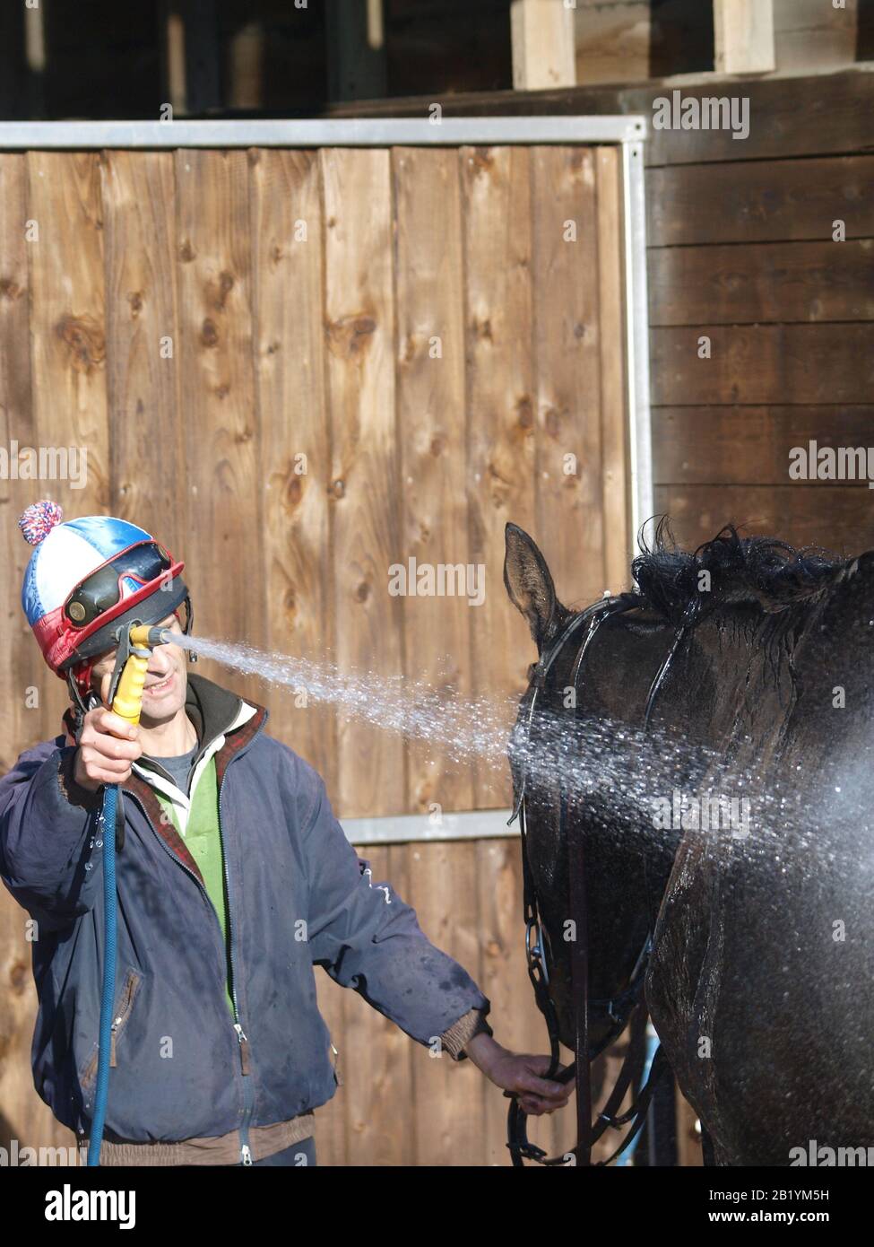 Being hosed down hi-res stock photography and images - Alamy