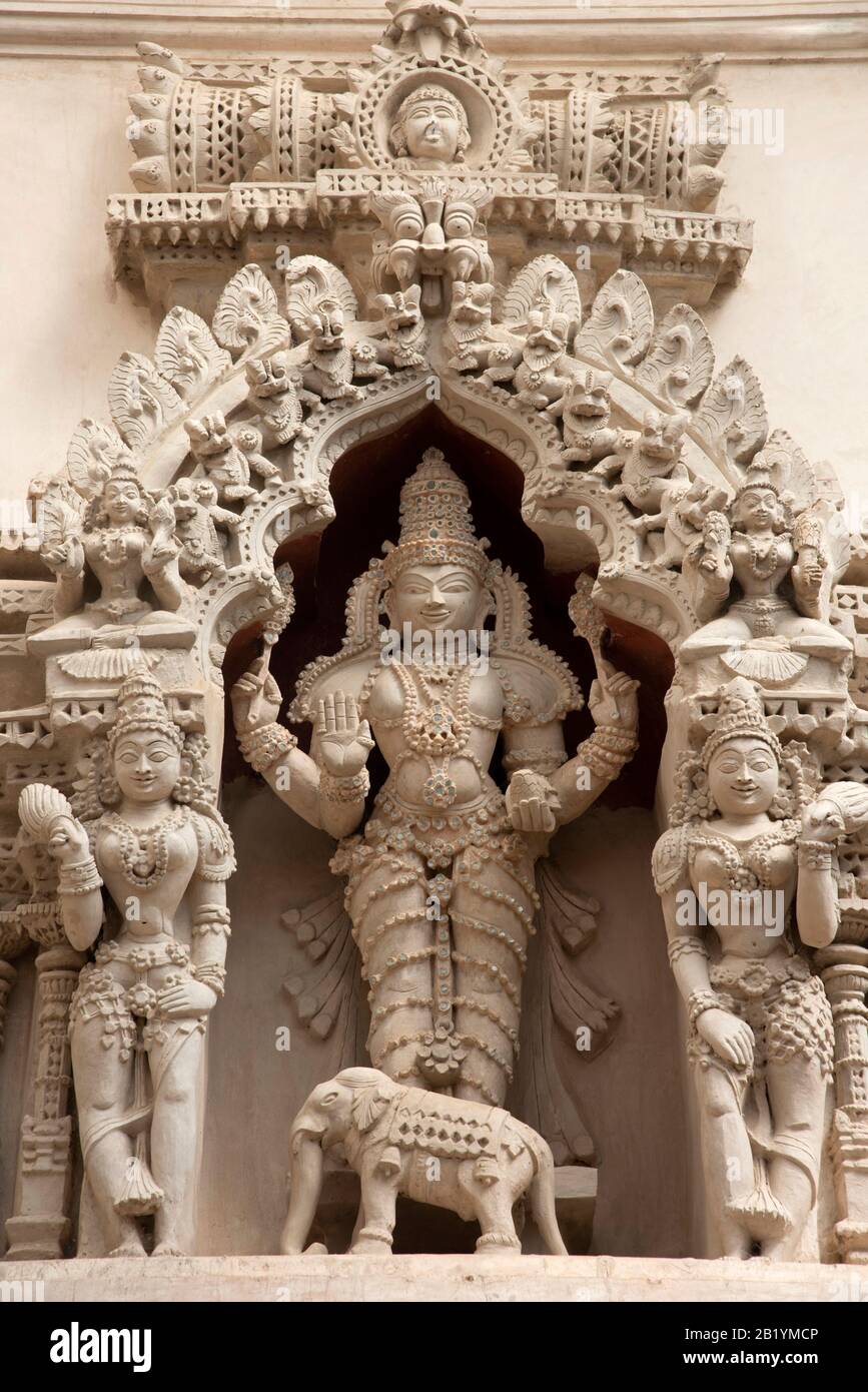 Colourful carved idols on the inner wall of Jain Mutt, Shravanabelagola ...