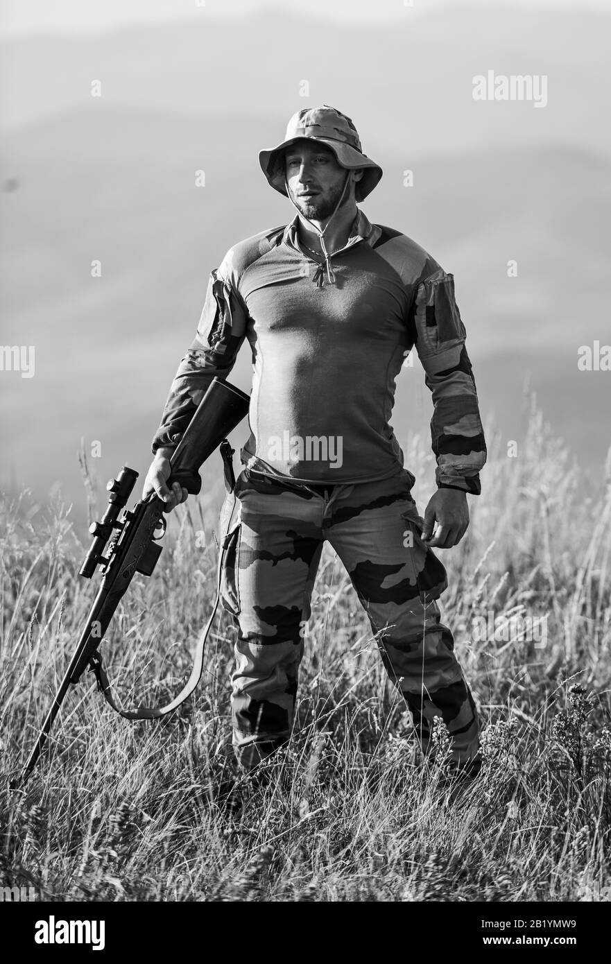 Ready to shoot. Army forces. Man military clothes with weapon. Focus ...