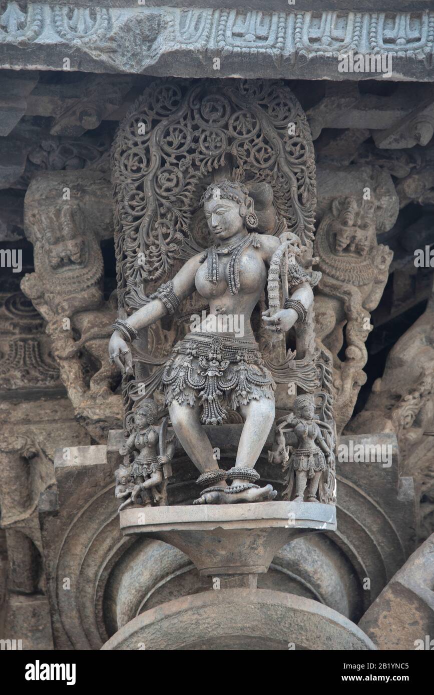 Madanika with a bow, celestial maiden on pillar Chennakeshava Temple ...