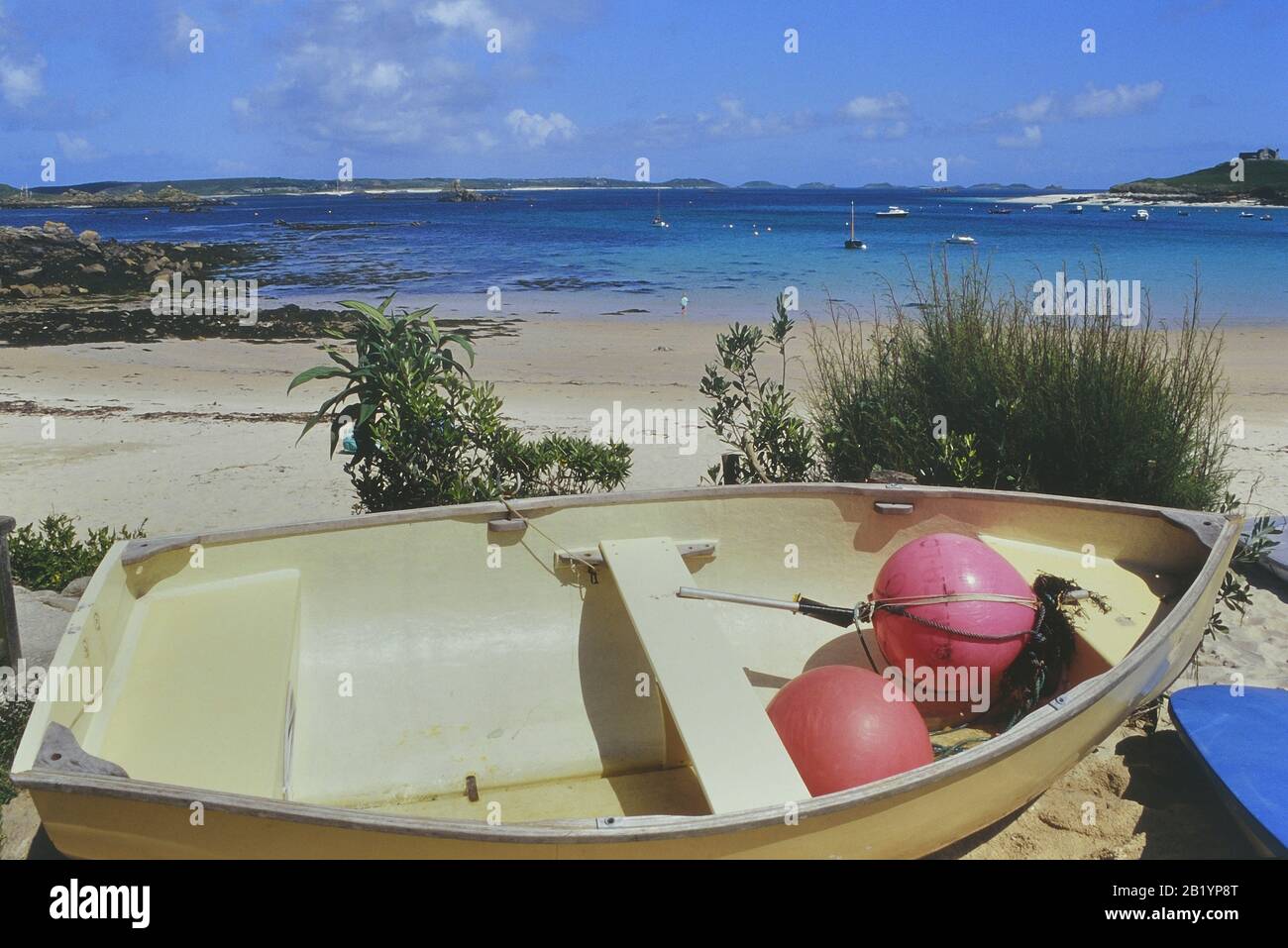 A moored rowing boat on the beach at Green Porth Old Grimsby. Tresco ...