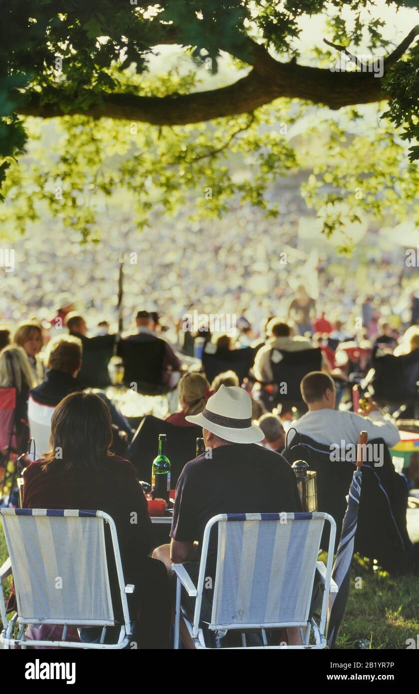 Outdoor classical concert crowd at Leeds Castle, Kent, England, UK ...