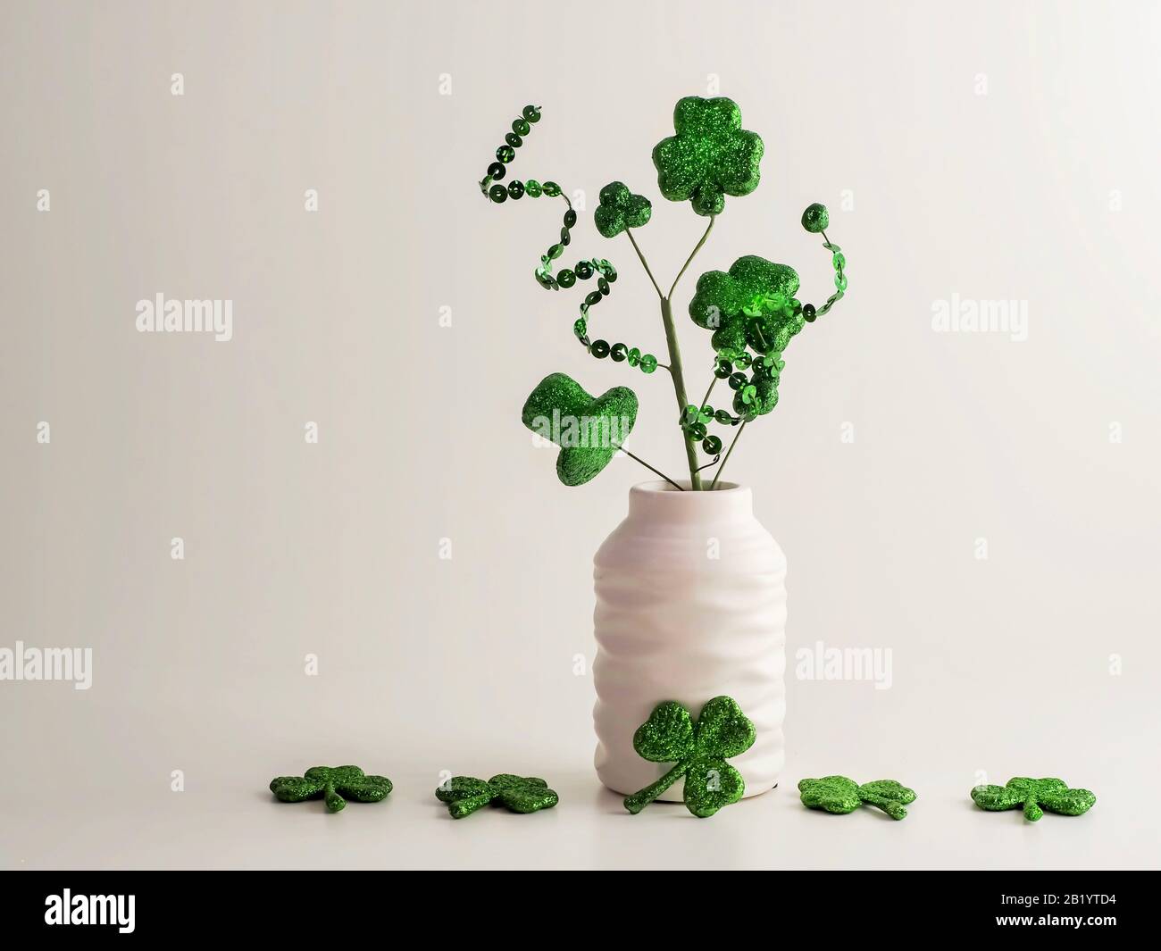 St. Patrick’s Day green glitter shamrock, four leaf clover, hat and ...