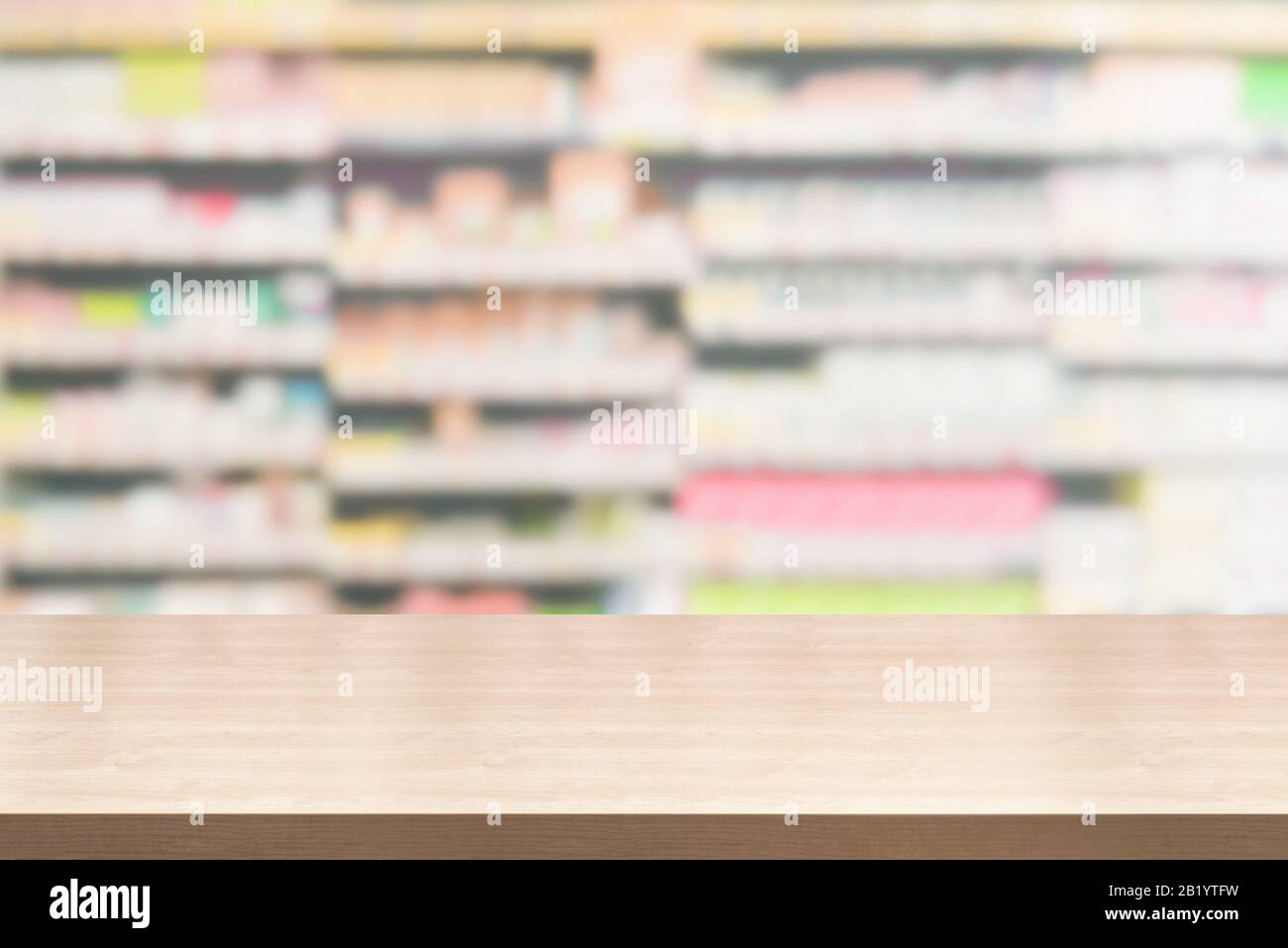 Wood table in pharmacy or drugstore background with empty copy space on ...