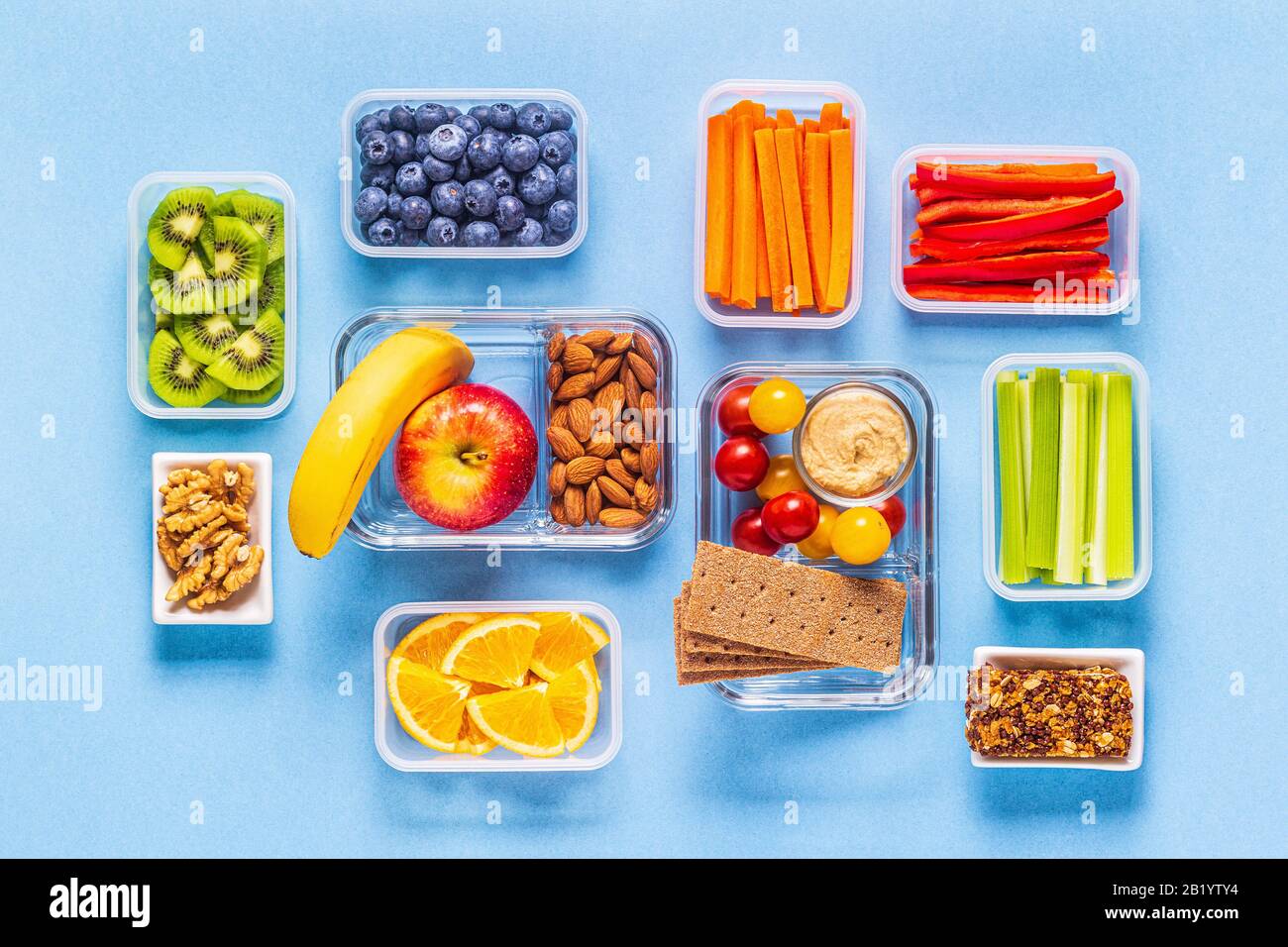 Healthy snack on a pastel background, top view Stock Photo - Alamy