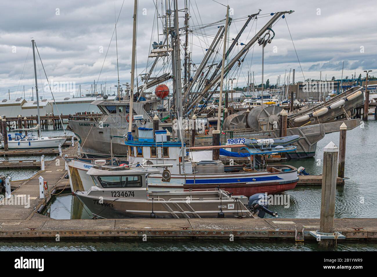 Line of Fishing Boats Stock Photo - Alamy