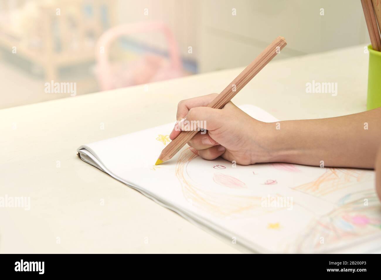 Close up pencil draw at notebook. Home office Stock Photo - Alamy
