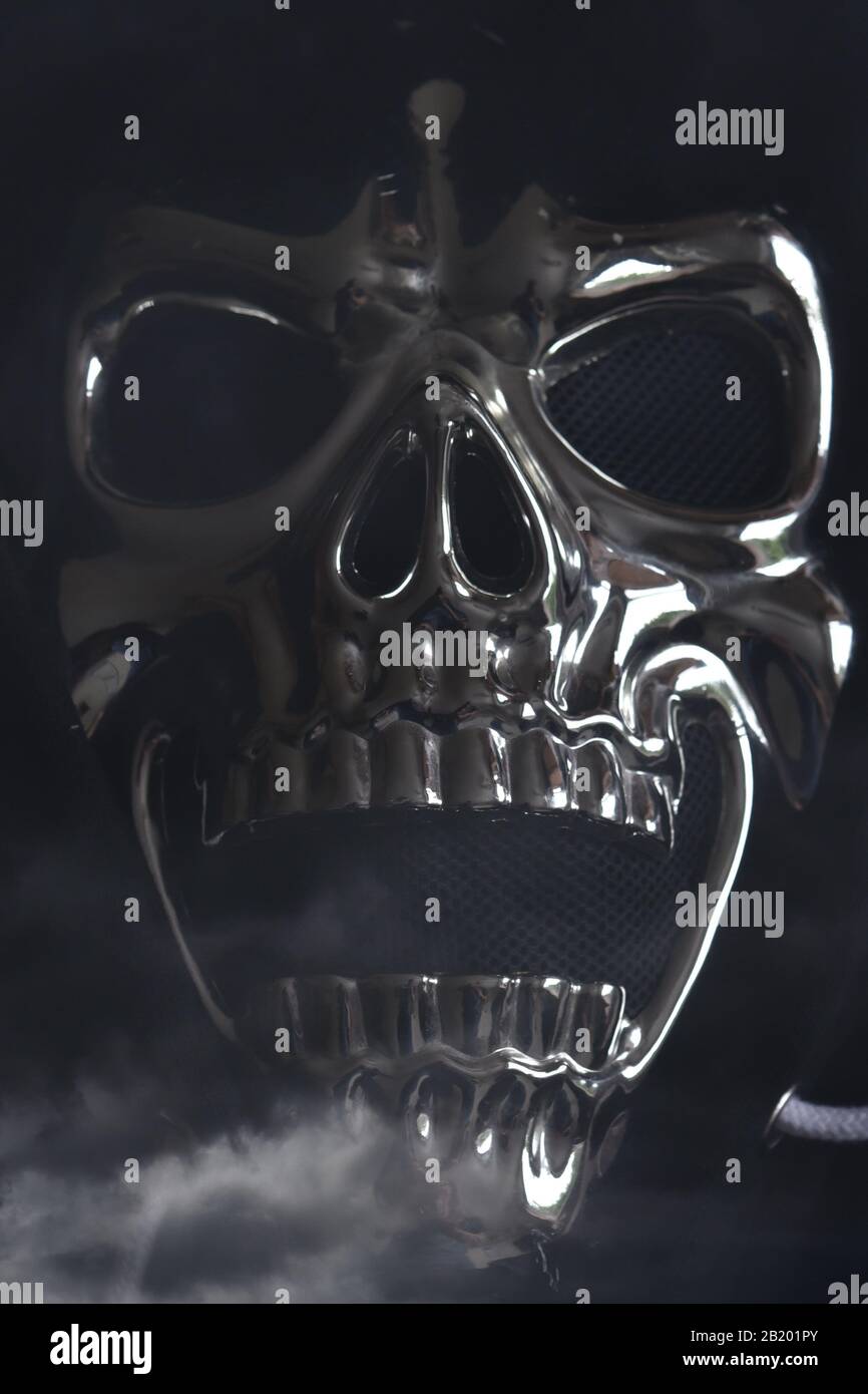 Death head skull mask double exposure against a cloudy sky Stock Photo ...