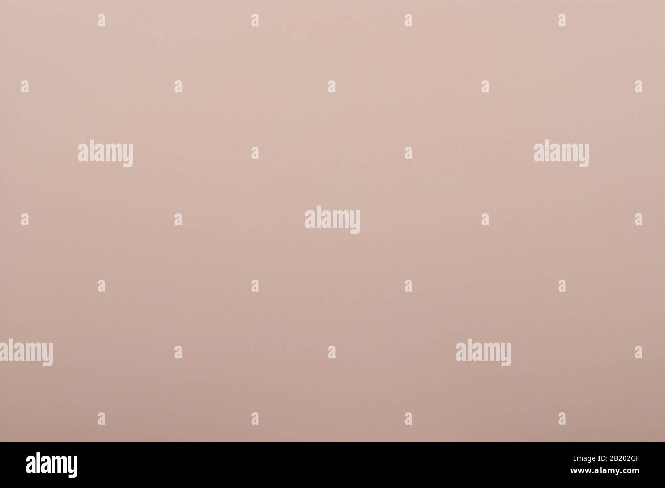 Flat beige color plastic background close up view Stock Photo - Alamy