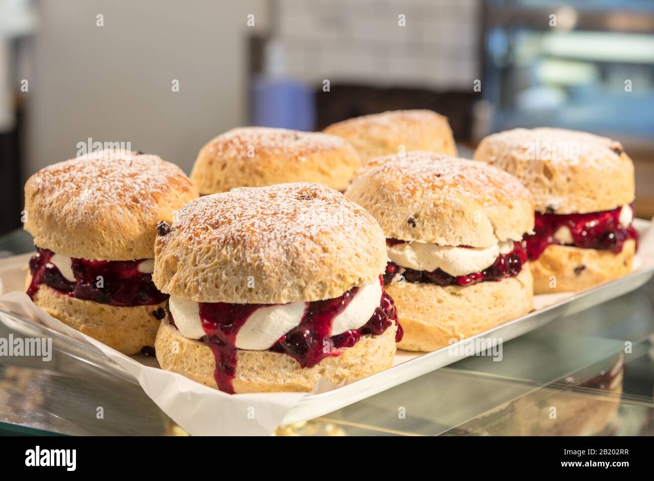 Six English Scones with Jam and Clotted Cream, Devon Cream Tea, on tray ...